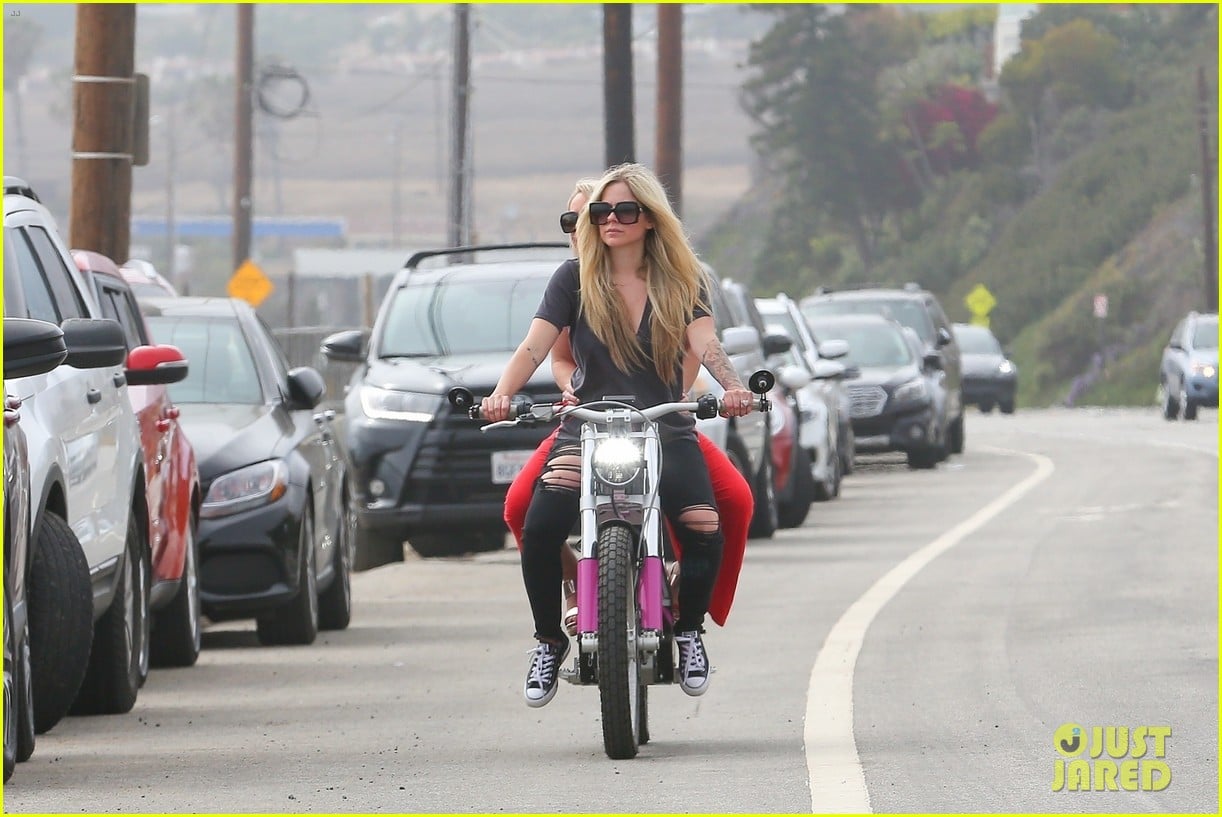 Avril Lavigne Rides A Hot Pink Motorcycle During Memorial Day Holiday ...