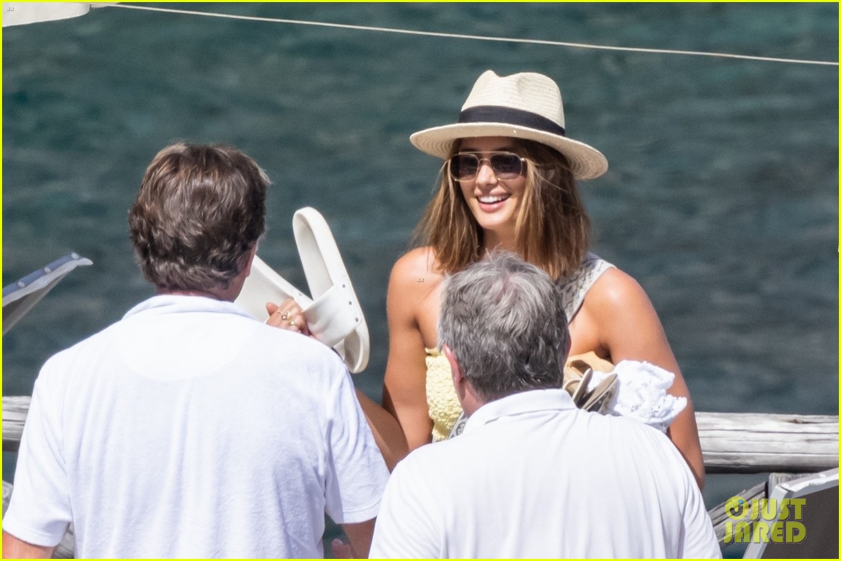 Newly Engaged Taylor Hill Enjoys a Boat Day in Italy with Fiance Daniel ...
