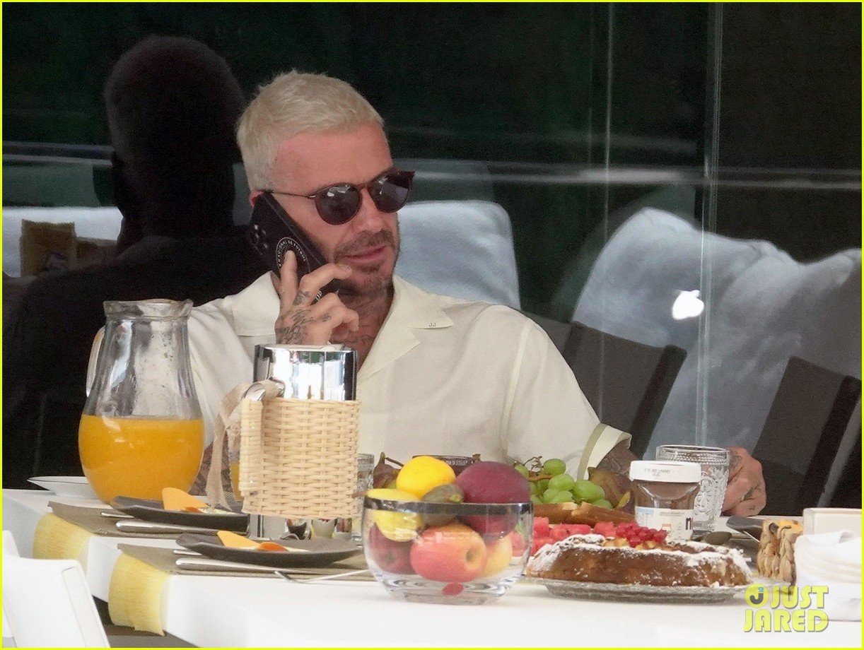 David Beckham Jumps Off a Yacht with His Pink-Haired Son Cruz: Photo ...