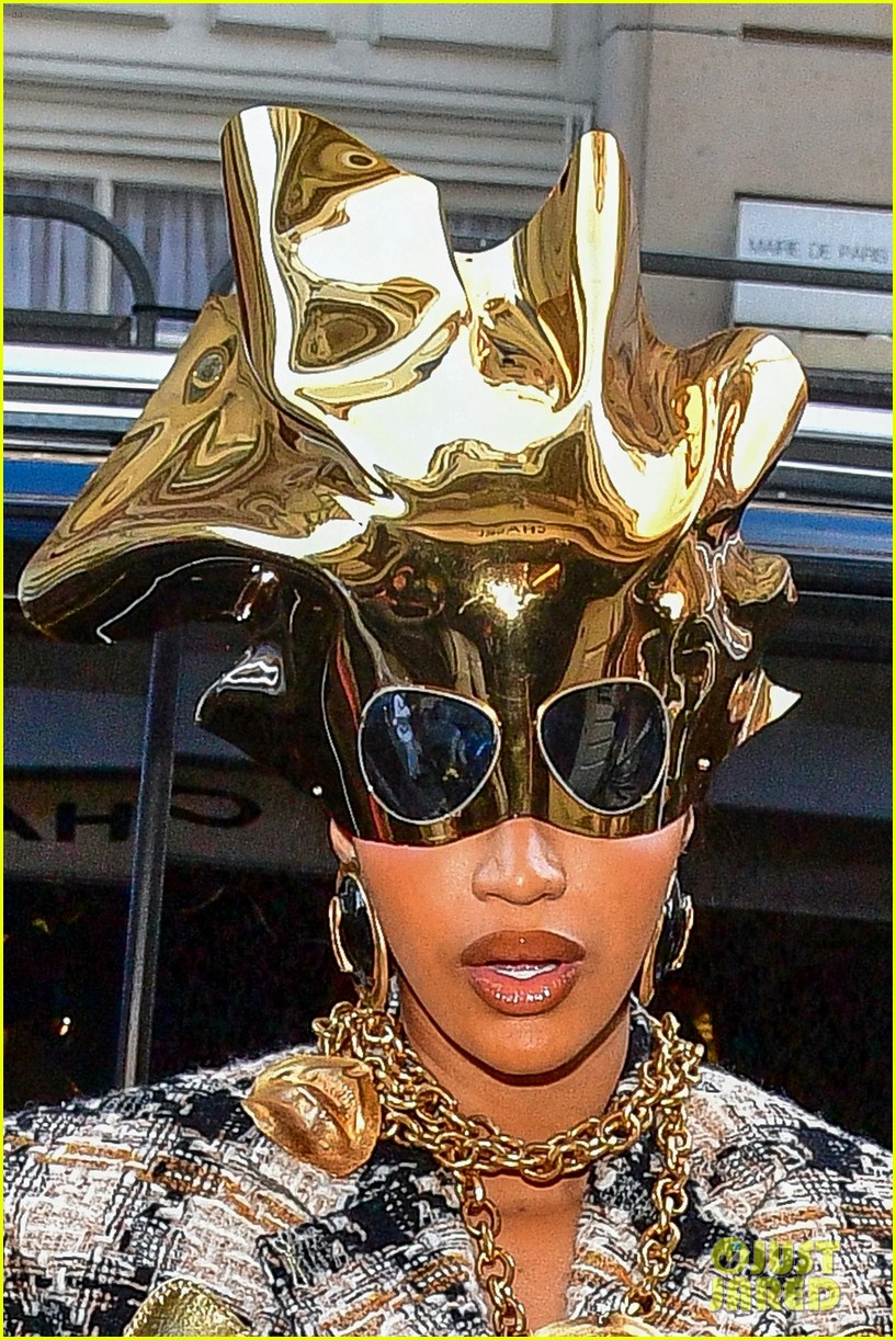 Cardi B Makes Bold Statement in Golden Schiaparelli Headpiece in Paris ...