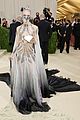 Grimes Carries A Sword & Wears Metal Mask To Met Gala 2021: Photo ...