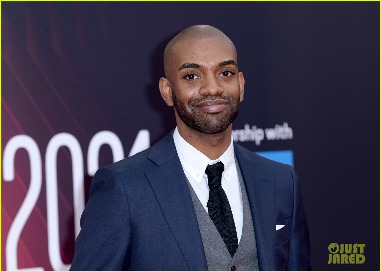 Honor Swinton Byrne Rocks A Shiny Trench Look For 'The Souvenir: Part ...