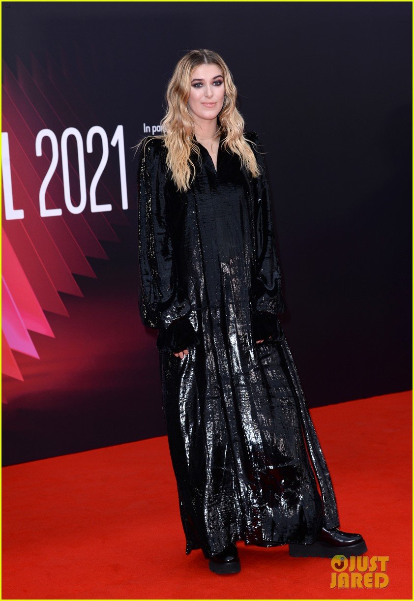 Honor Swinton Byrne Rocks A Shiny Trench Look For 'The Souvenir: Part ...