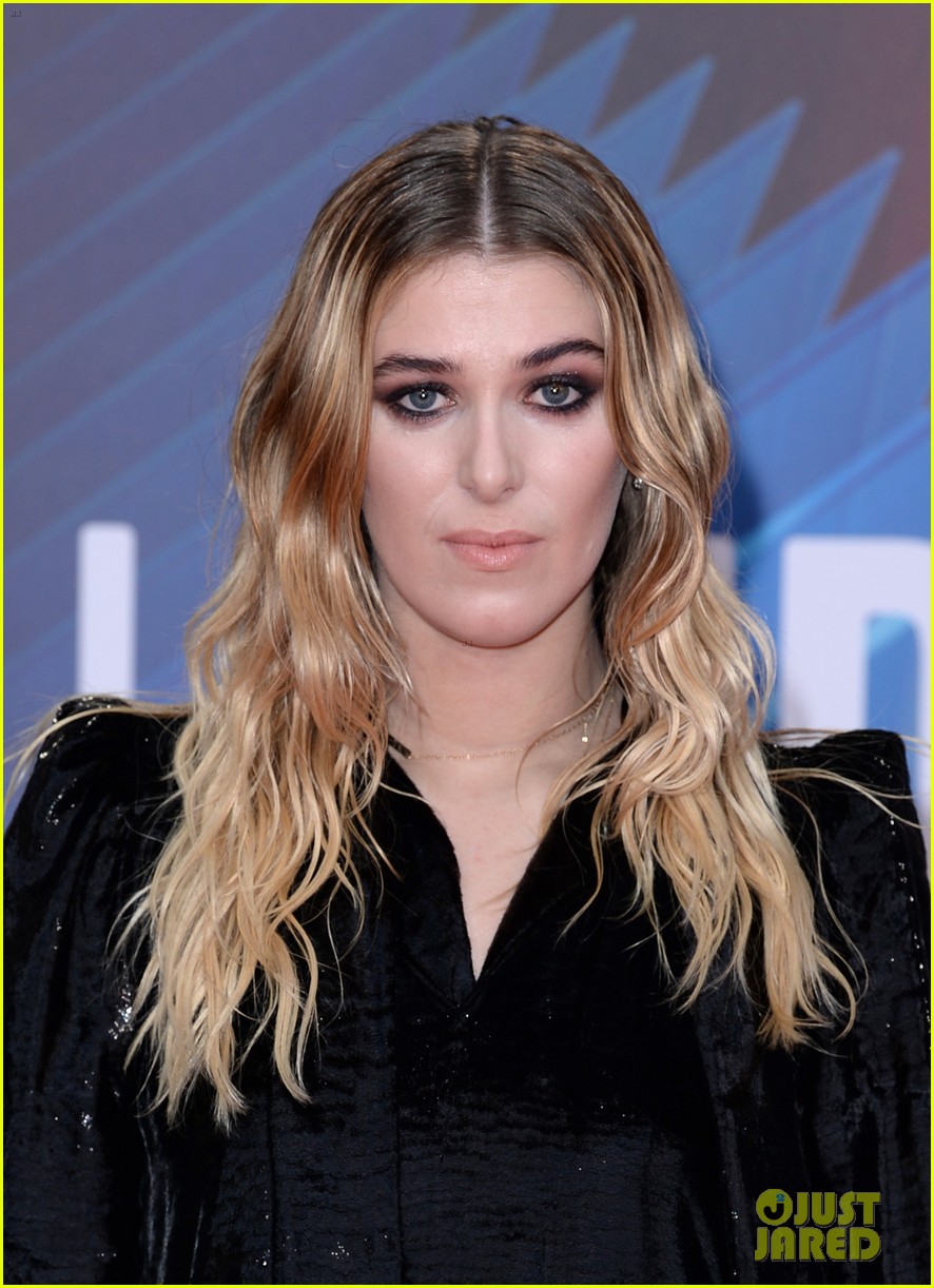 Honor Swinton Byrne Rocks A Shiny Trench Look For 'The Souvenir: Part ...