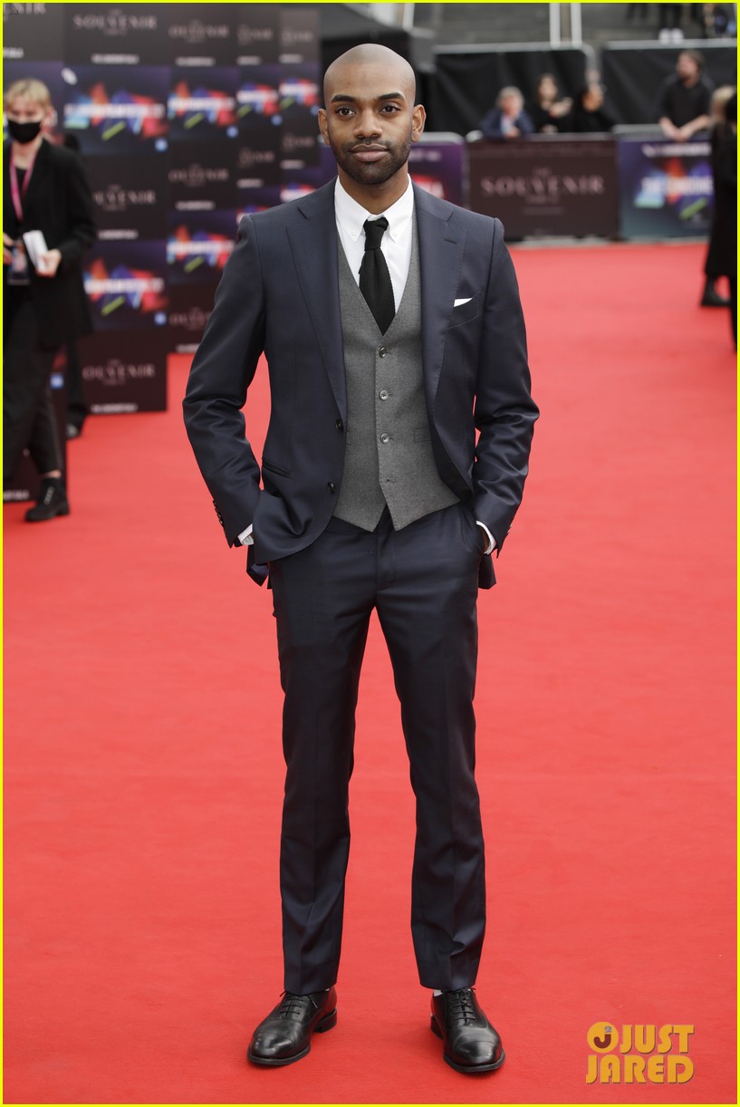 Honor Swinton Byrne Rocks A Shiny Trench Look For 'The Souvenir: Part ...