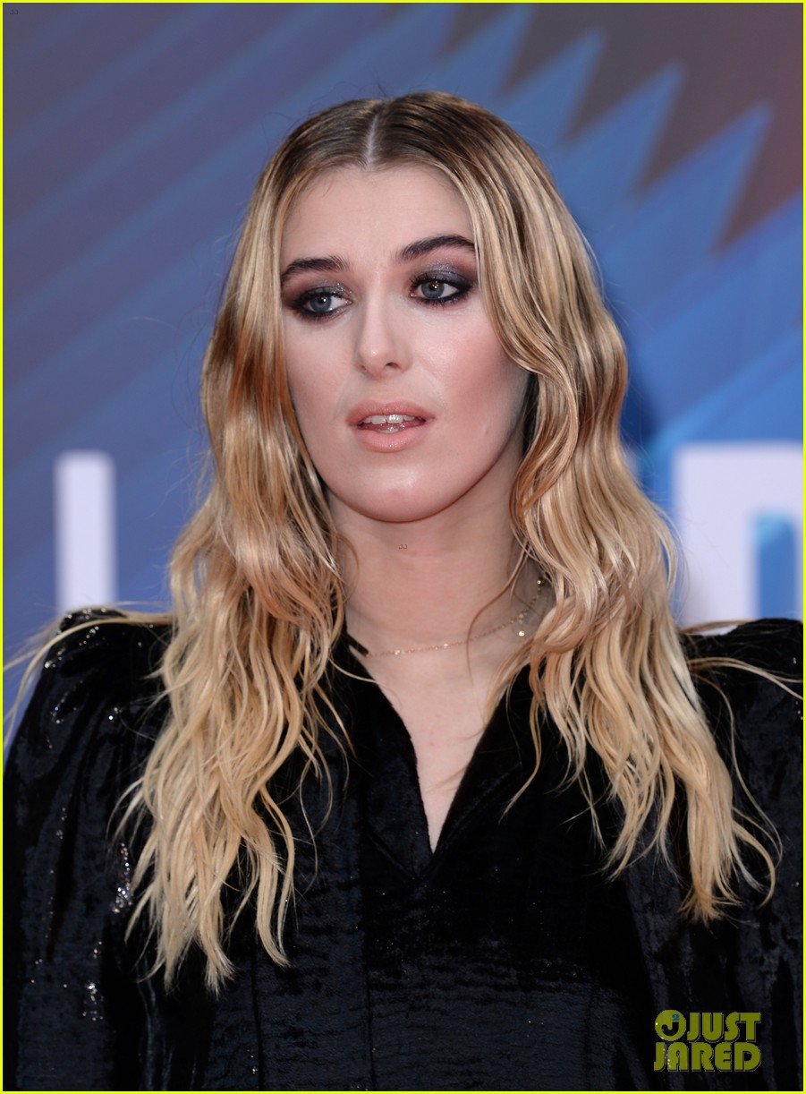 Honor Swinton Byrne Rocks A Shiny Trench Look For 'The Souvenir: Part ...