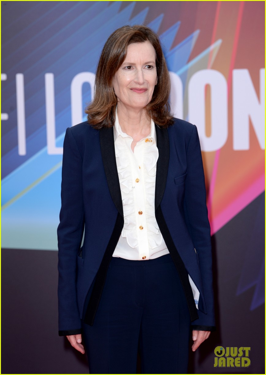 Honor Swinton Byrne Rocks A Shiny Trench Look For 'The Souvenir: Part ...