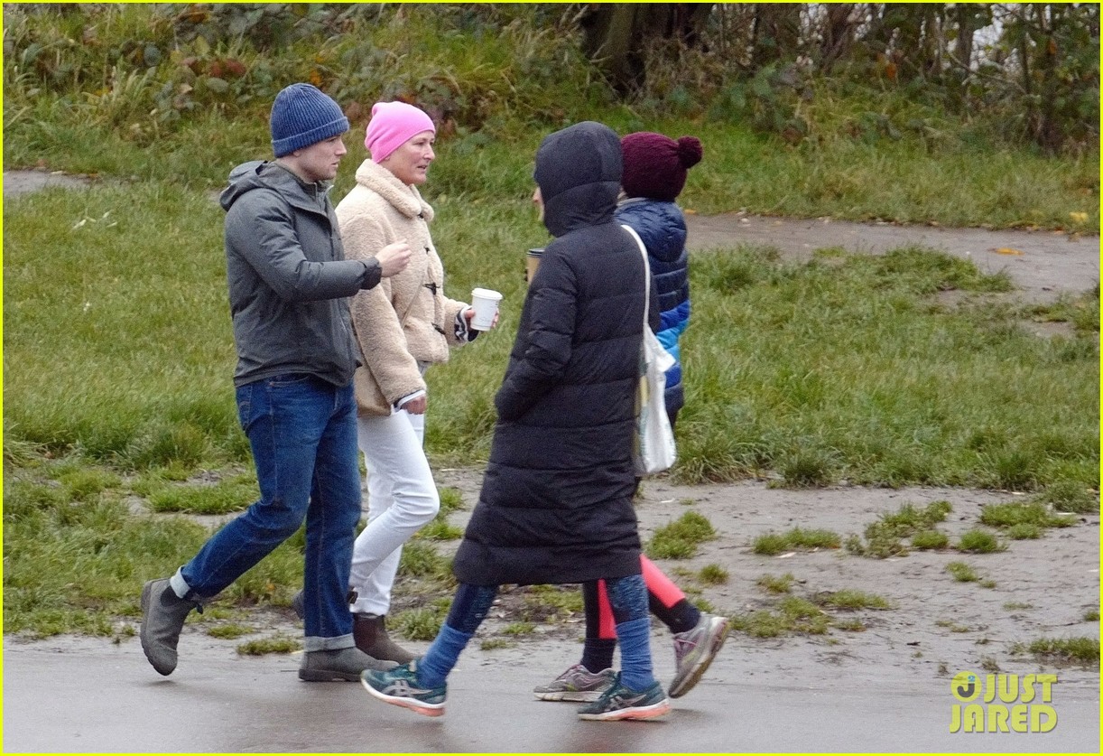 Taron Egerton Bundles Up for Walk in the Park with His Mom: Photo ...