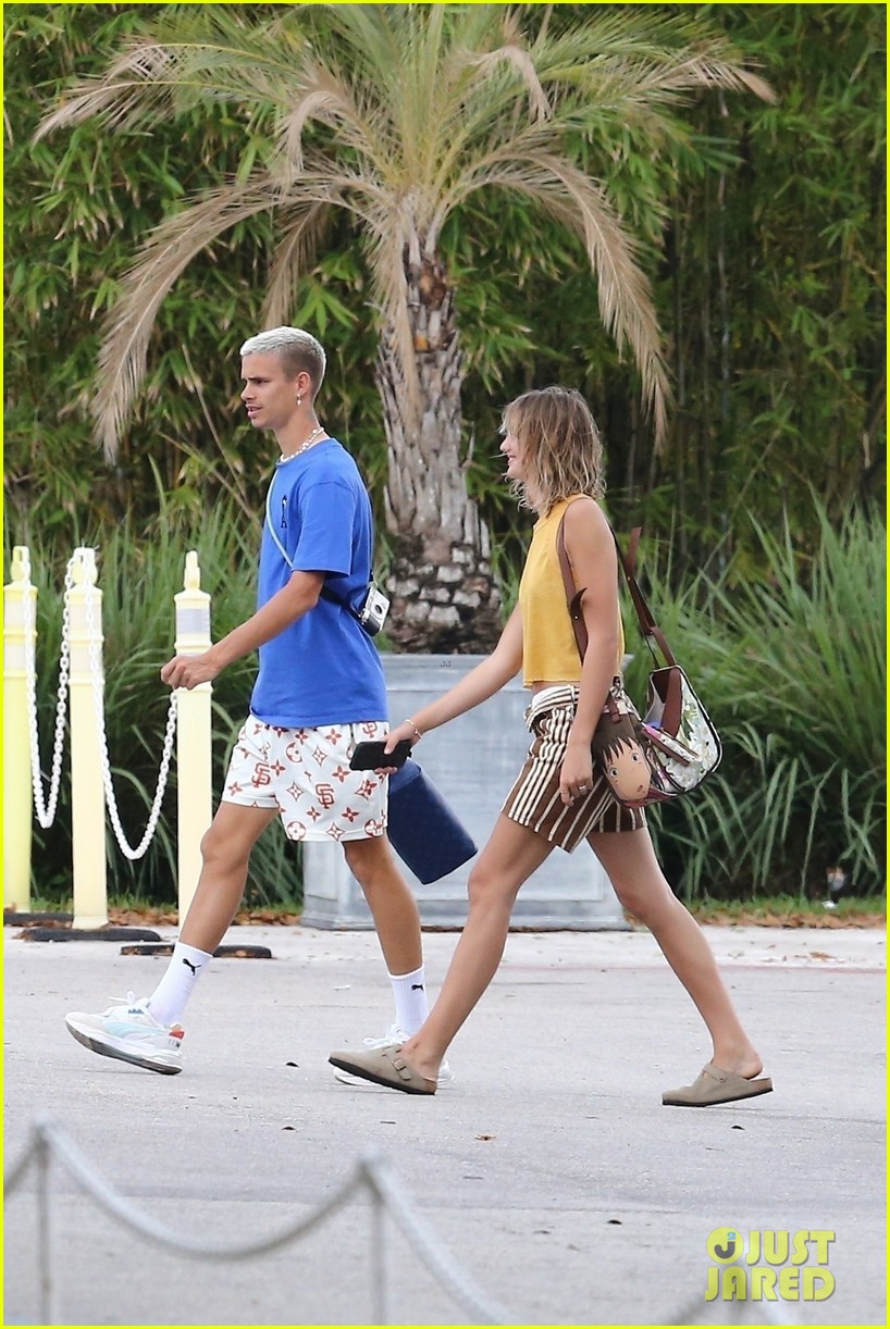 Romeo Beckham Cuddles Up with Girlfriend Mia Regan on a Boat in Miami ...