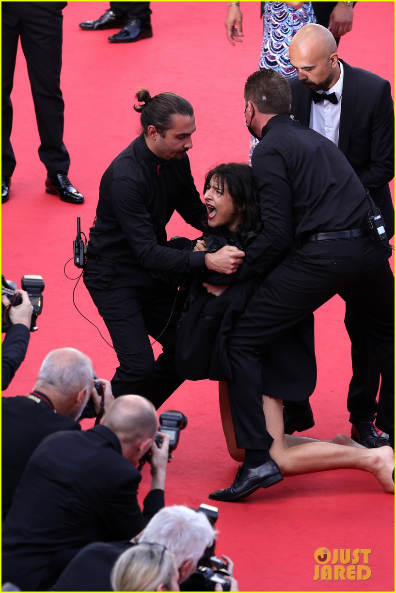 Topless Protester Storms the Red Carpet at Cannes 2022 Premiere - See ...