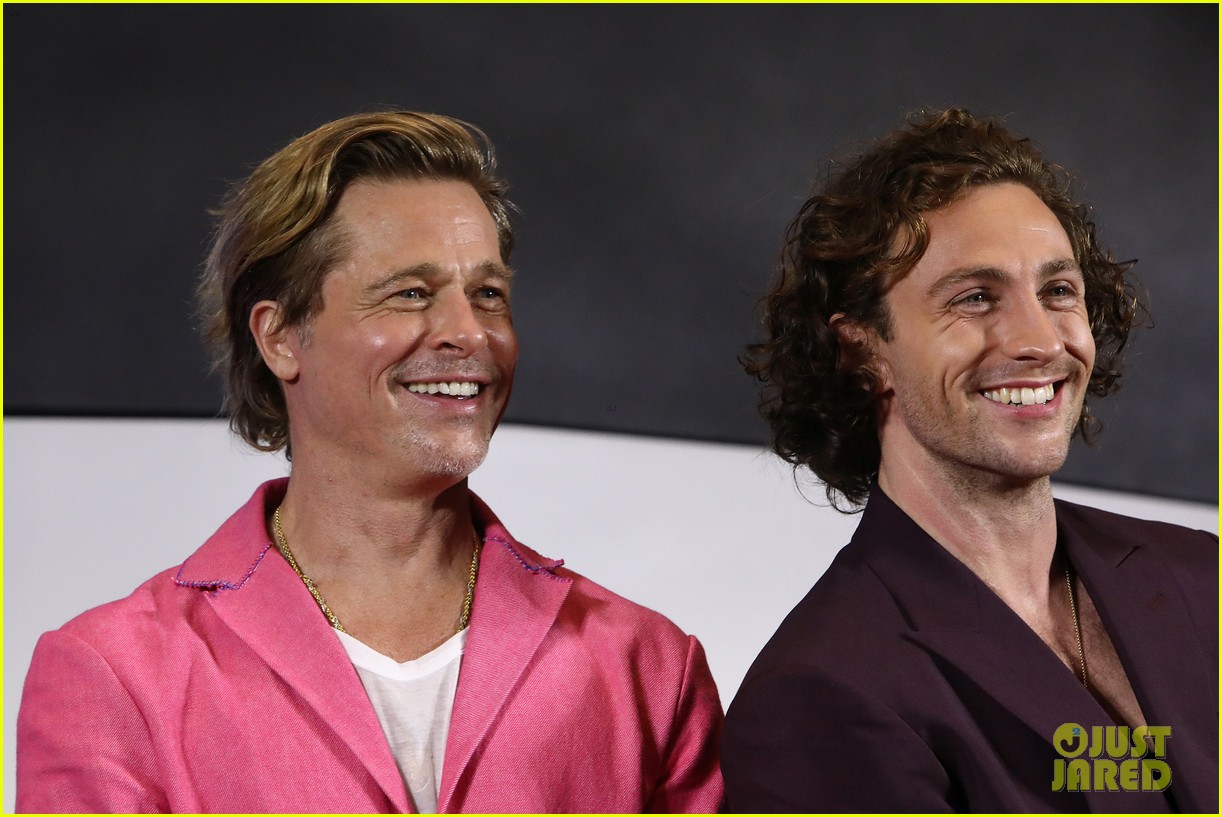 Brad Pitt & Aaron Taylor-Johnson Do Adorable Heart Poses at 'Bullet ...