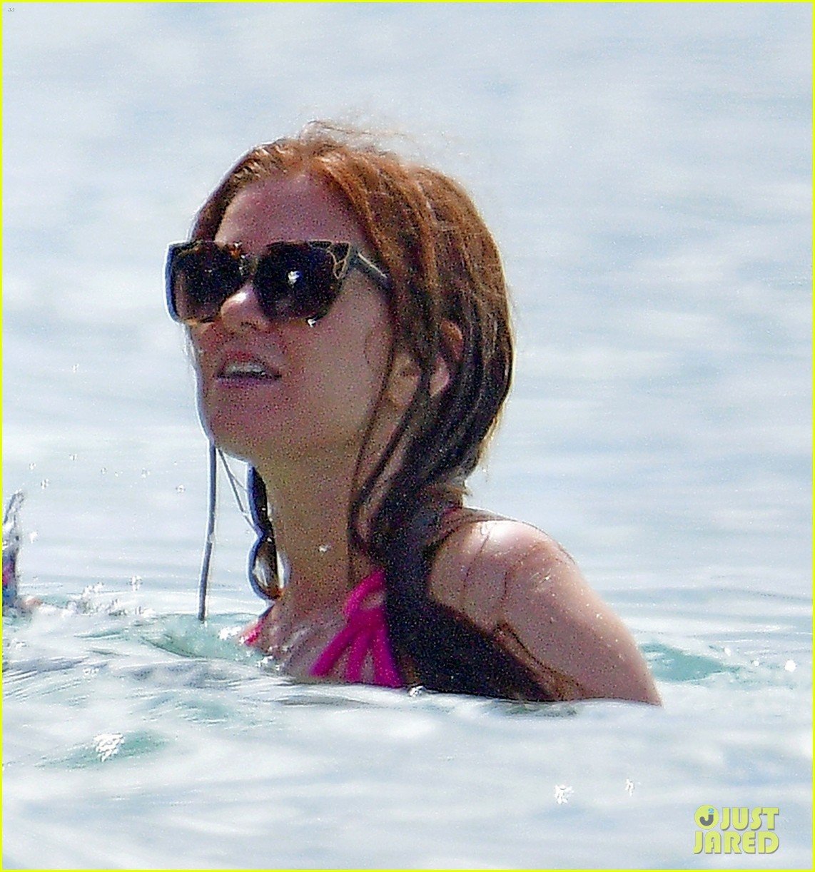 Isla Fisher Wears Pink Bathing Suit During Beach Day with Sacha Baron ...