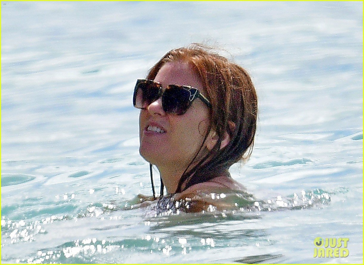 Isla Fisher Wears Pink Bathing Suit During Beach Day with Sacha Baron ...