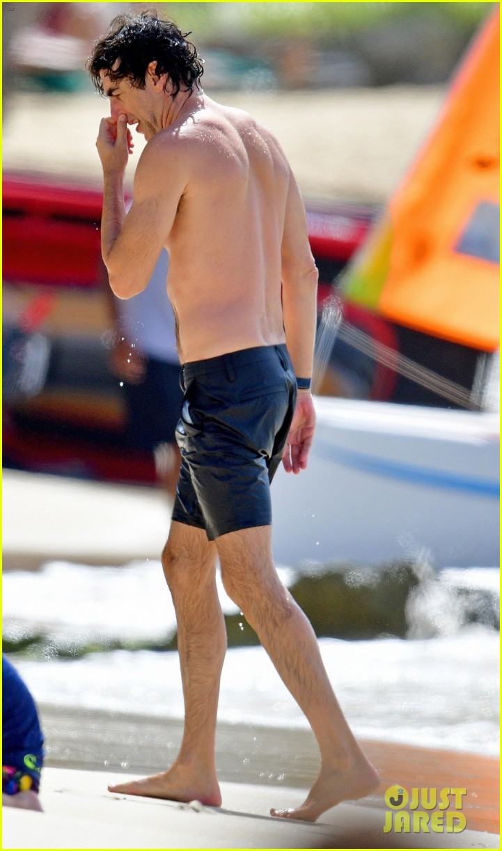 Isla Fisher Wears Pink Bathing Suit During Beach Day with Sacha Baron ...