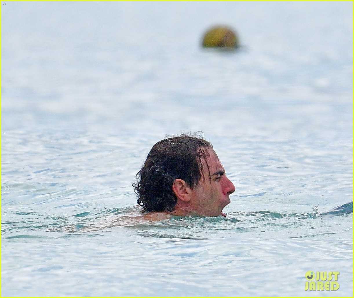 Isla Fisher Wears Pink Bathing Suit During Beach Day with Sacha Baron ...