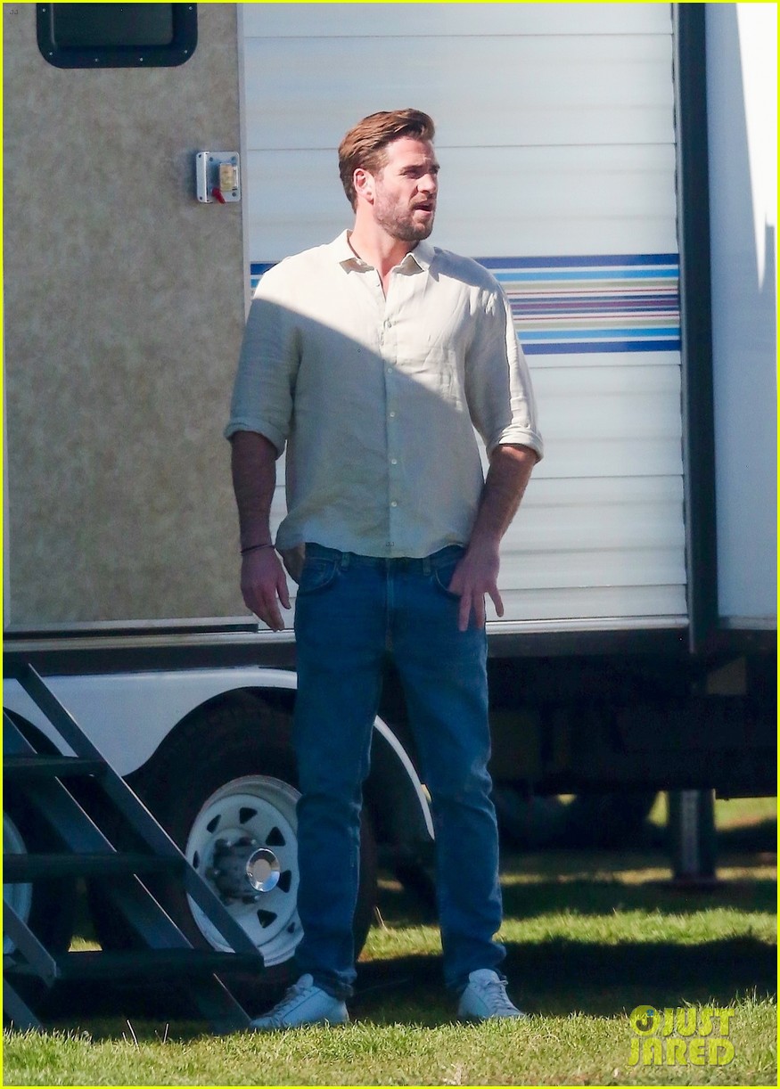 Liam Hemsworth Takes a Break on the Set of 'Lonely Planet': Photo ...