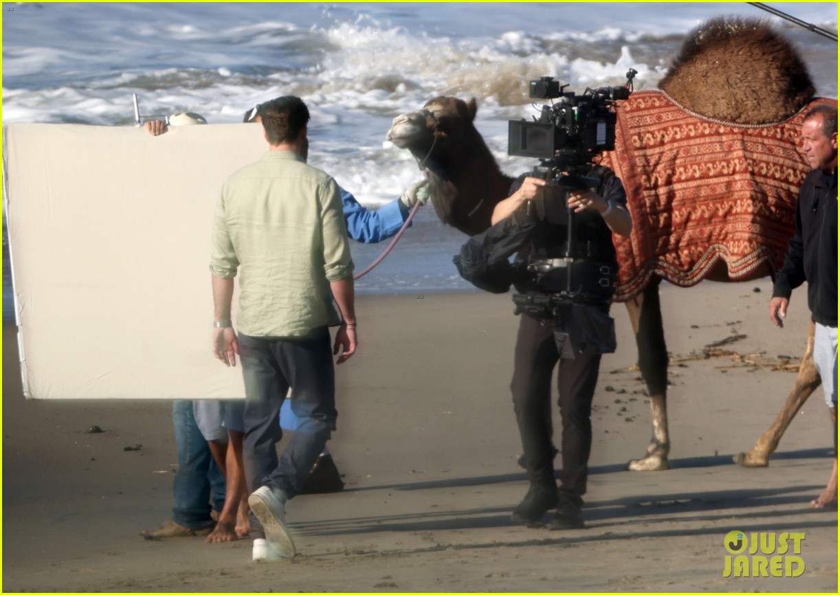 Liam Hemsworth Films New Netflix Movie 'Lonely Planet' with a Camel at ...