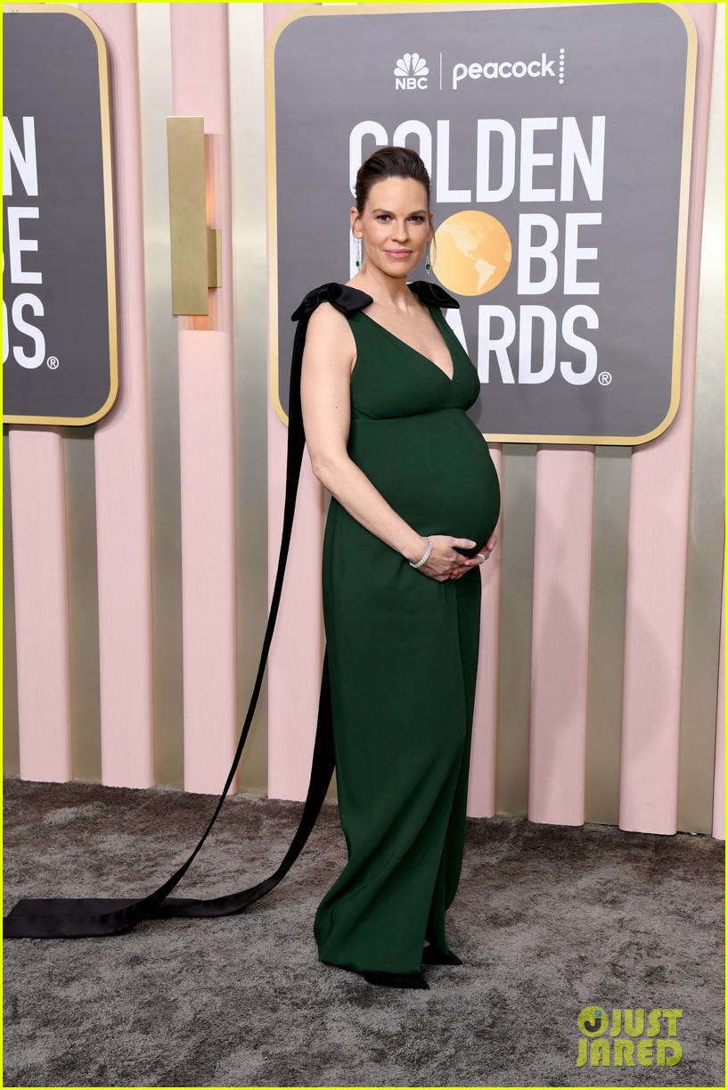 Hilary Swank Cradles Her Baby Bump While Arriving at Golden Globes 2023 with Husband Philip ...