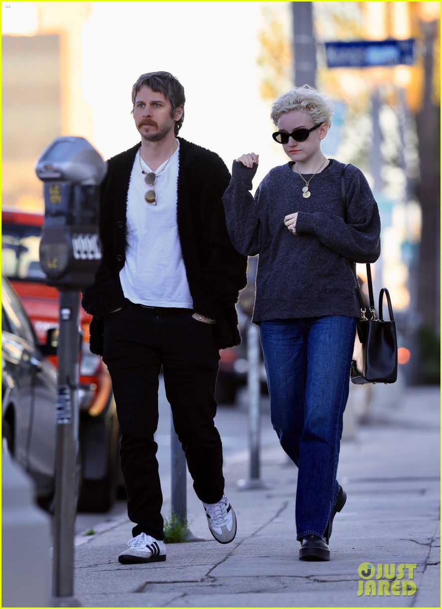 Julia Garner Steps Out with Husband Mark Foster After Madonna Biopic ...