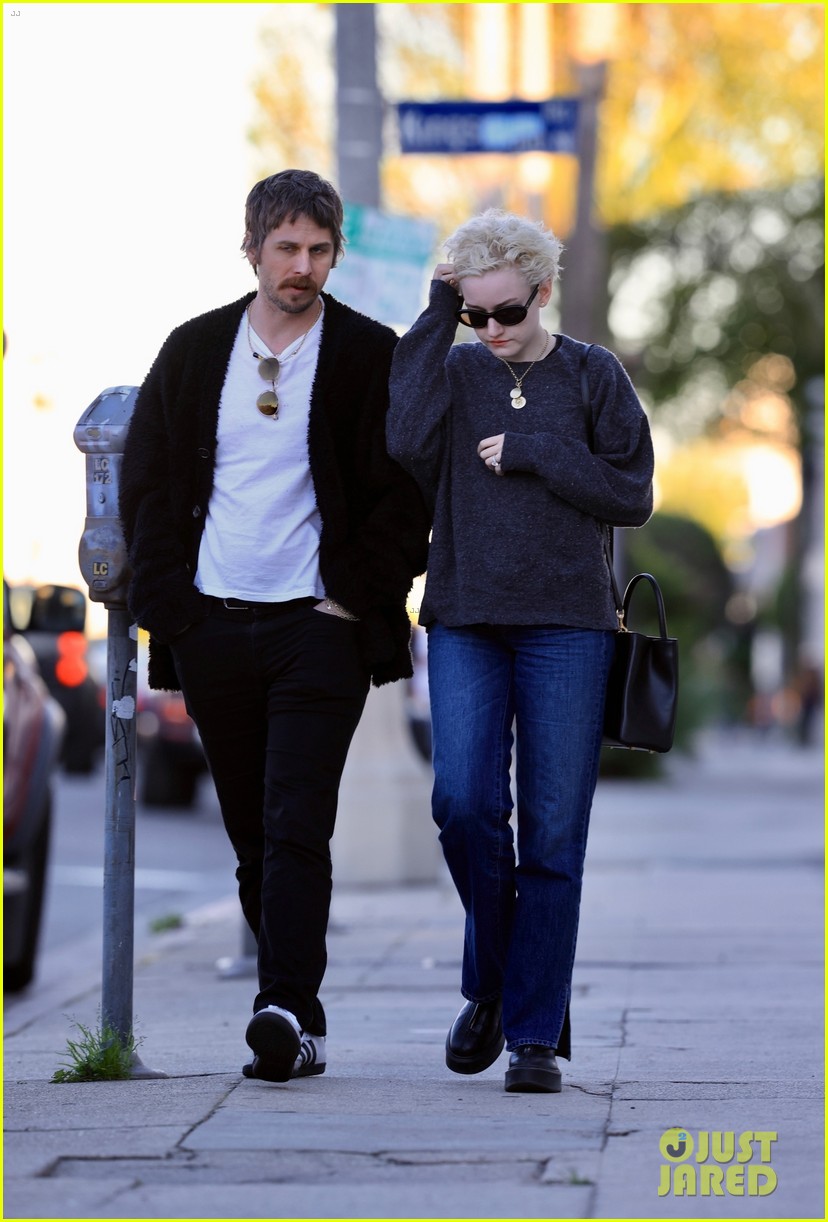 Julia Garner Steps Out with Husband Mark Foster After Madonna Biopic ...