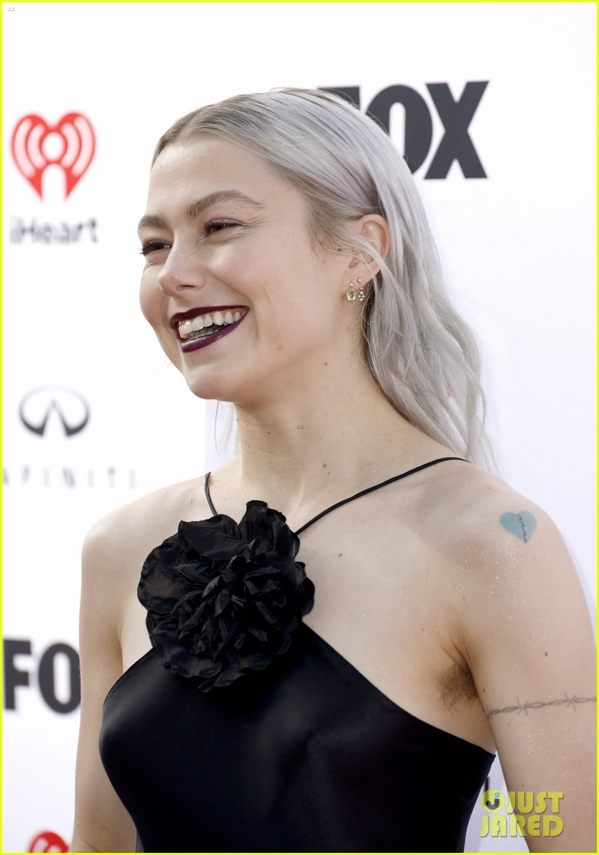 Presenter Phoebe Bridgers Arrives In Classic Black Dress For The 2023 iHeartRadio Music Awards ...