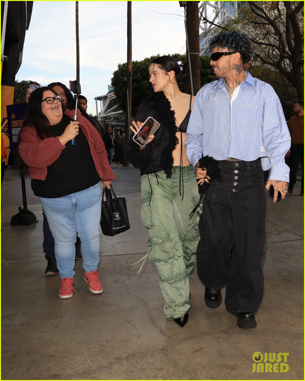 Rosalia & Fiance Rauw Alejandro Hold Hands While Heading to Lakers Game ...