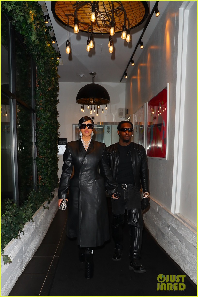 Cardi B Wears Heelless Shoes While Matching In Futuristic Outfits With ...