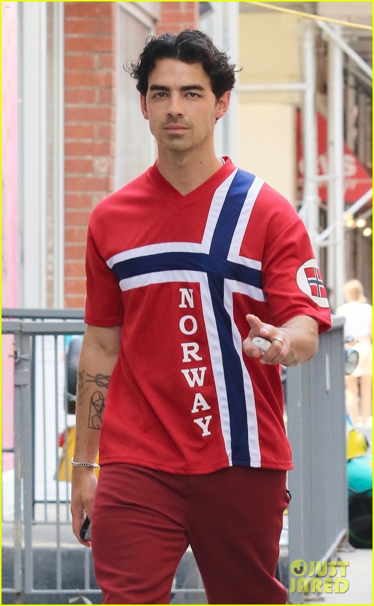 Joe Jonas Flashes a Peace Sign, Reps Norway Soccer Jersey Ahead of FIFA ...