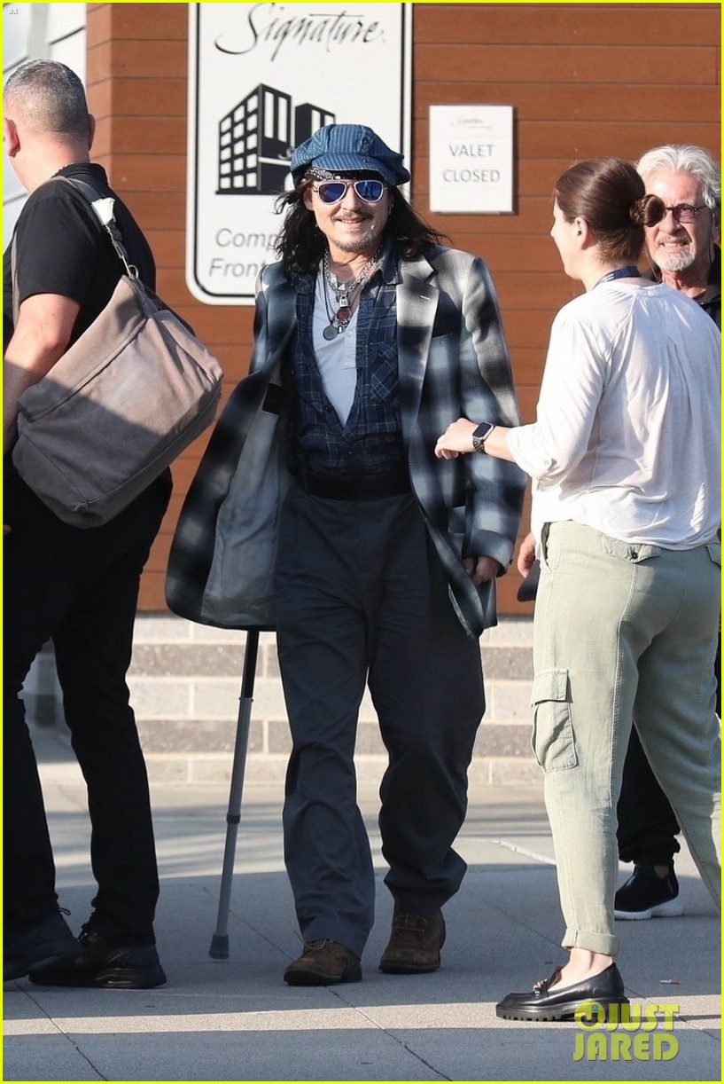 Johnny Depp Is All Smiles While Walking With a Cane After Ankle Injury ...
