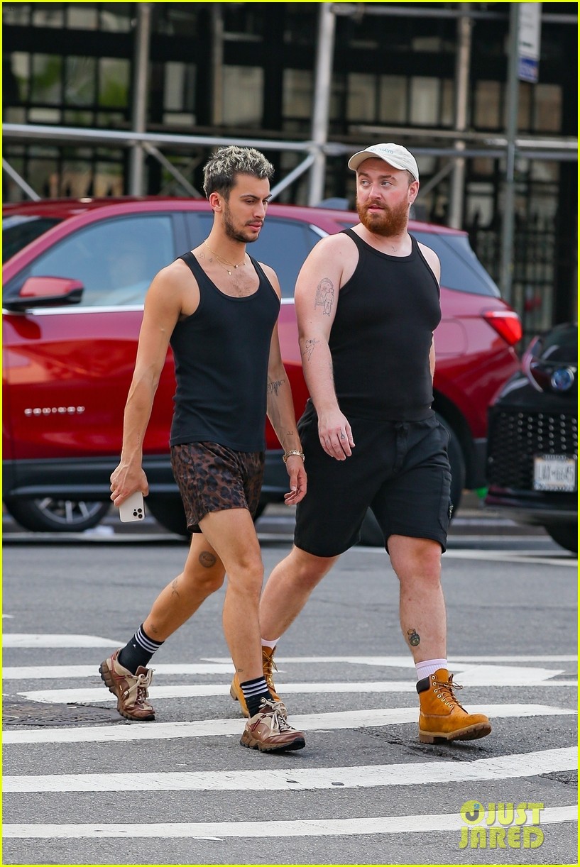 Sam Smith & Partner Christian Cowan Match In Black Tanks While Out in ...