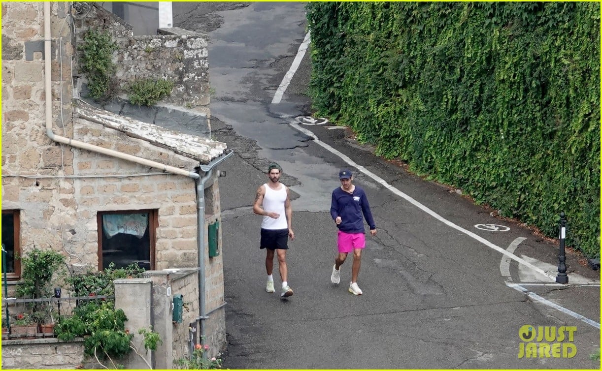 Harry Styles Spotted Jogging Around Italy with His Personal Trainer in ...