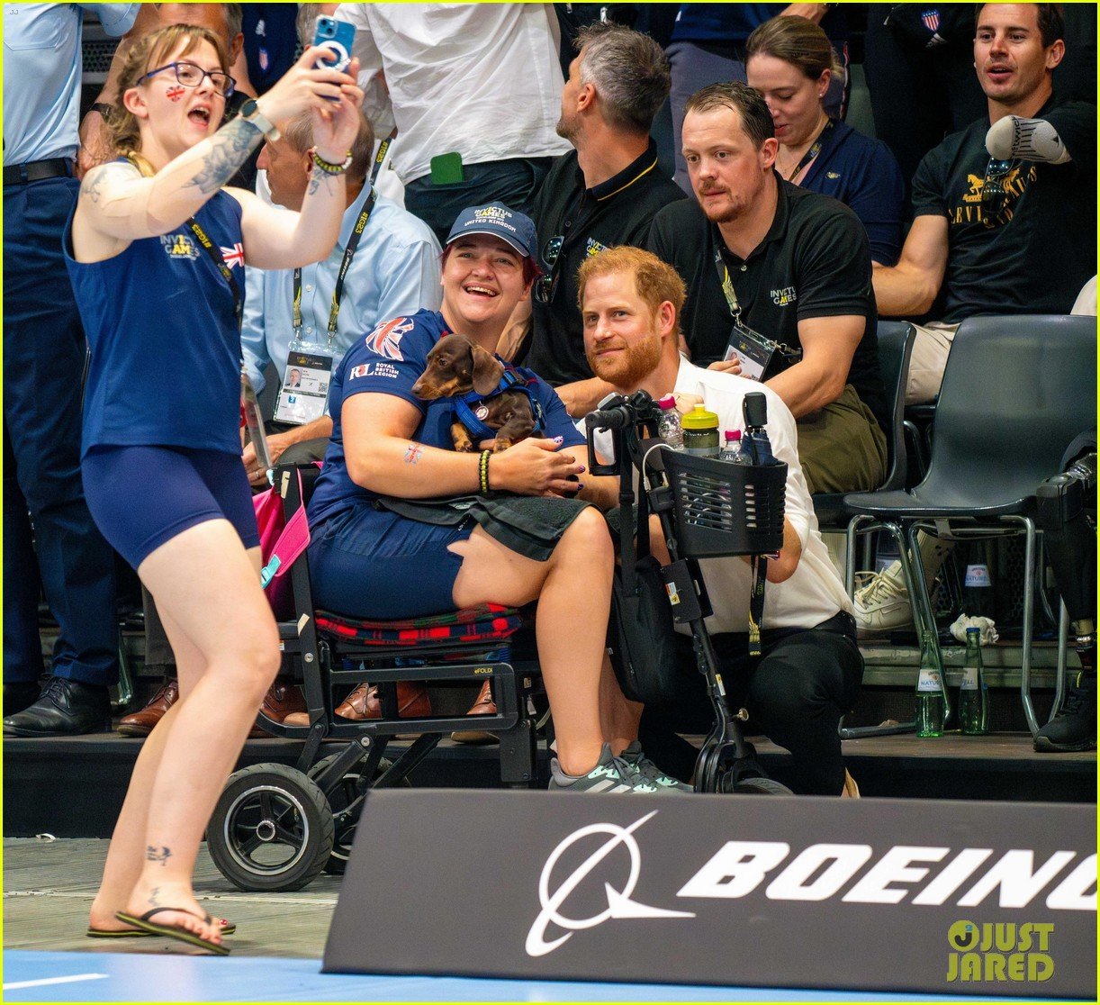 Prince Harry Says He & Meghan Markle Are A 'Competitive' Family During ...