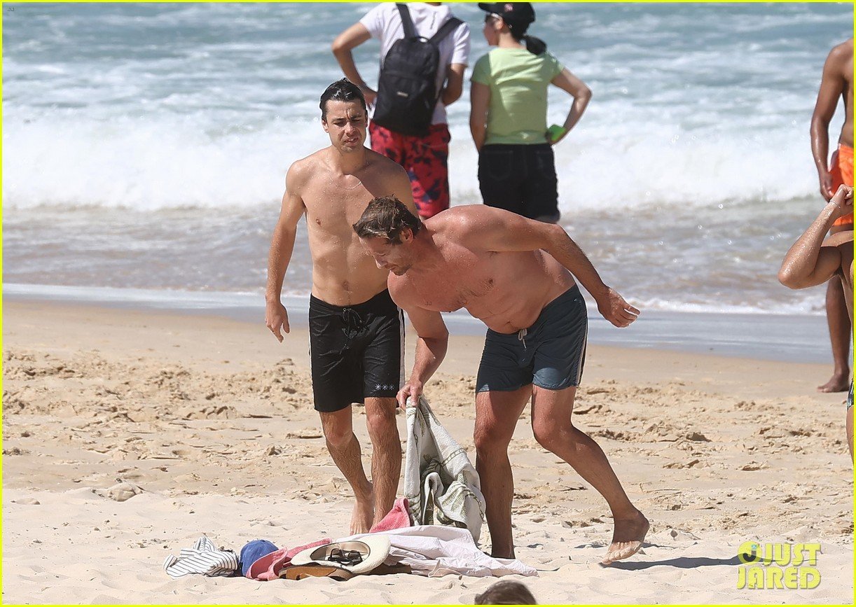 Simon Baker Hits the Beach for Shirtless Beach Day with Son Claude ...