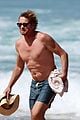 Simon Baker Hits the Beach for Shirtless Beach Day with Son Claude ...