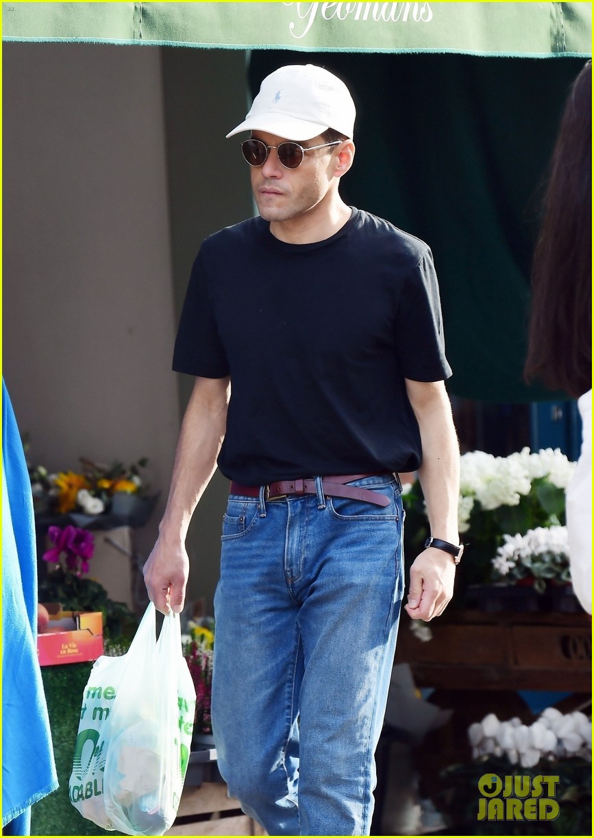 Rami Malek & Emma Corrin Hold Hands on Shopping Date in London: Photo ...