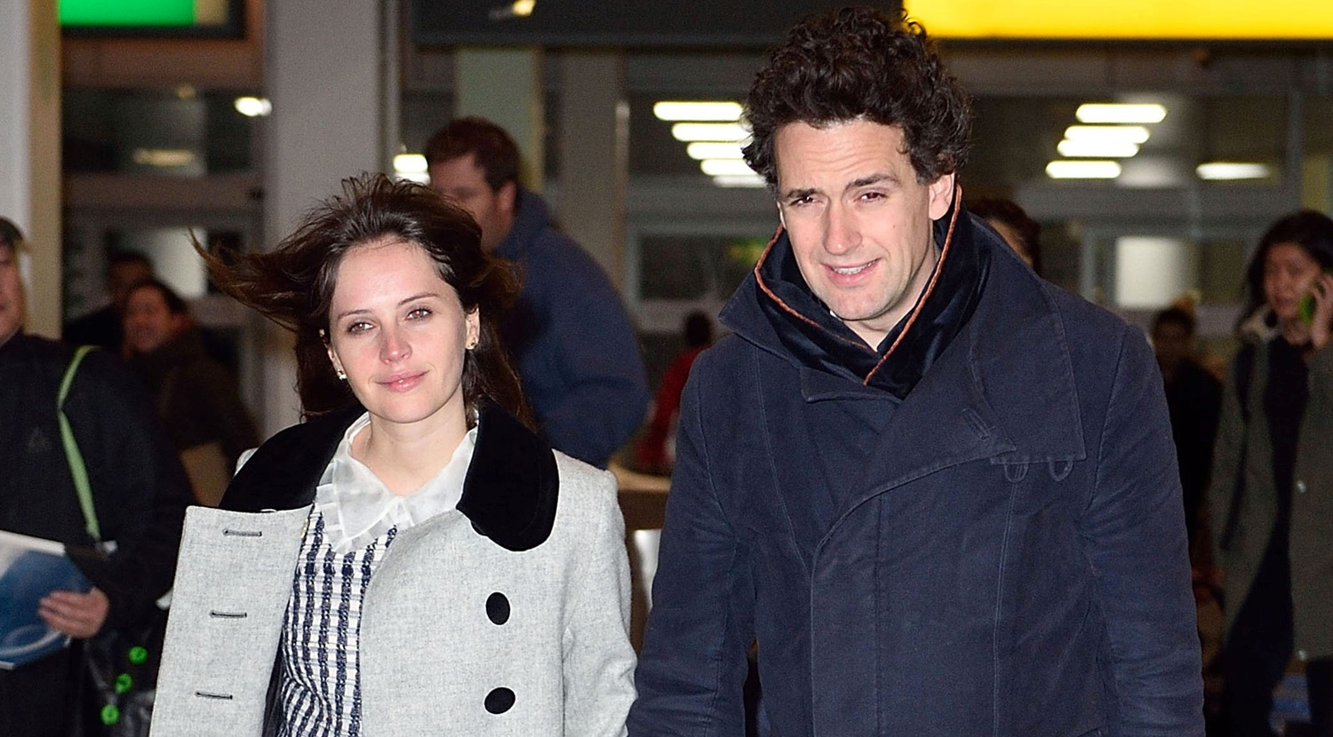 Felicity Jones Holds Hands with Boyfriend Charles Guard at JFK ...