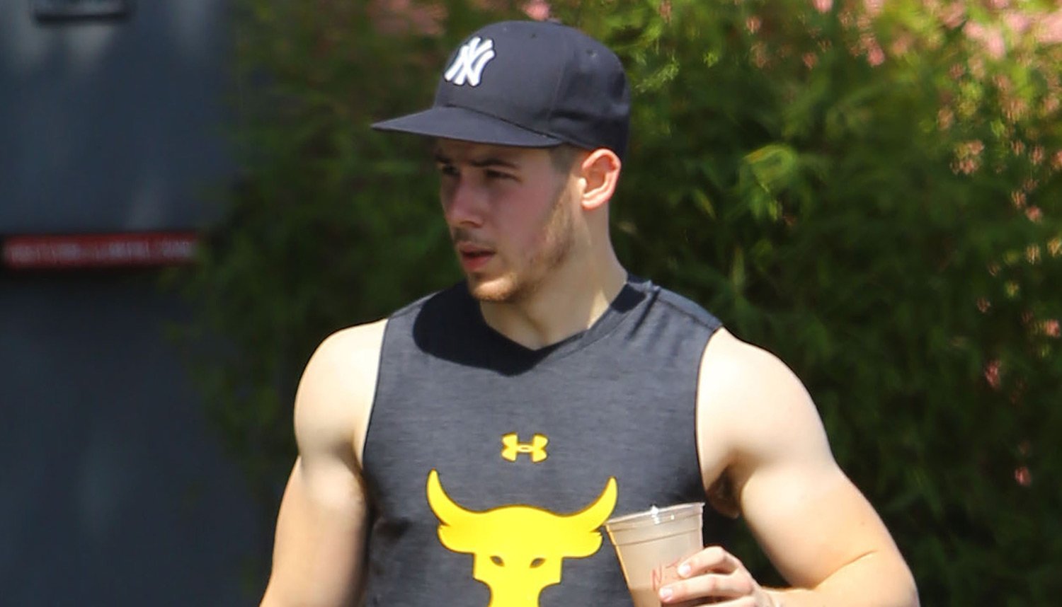 Nick Jonas Bares His Buff Biceps Ahead of Dior Fashion Show | Nick ...