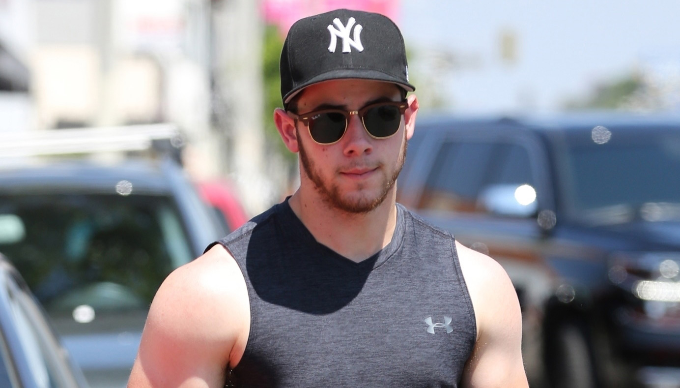 Nick Jonas Bares Buff Biceps & Farmer’s Tan After a Workout | Nick ...