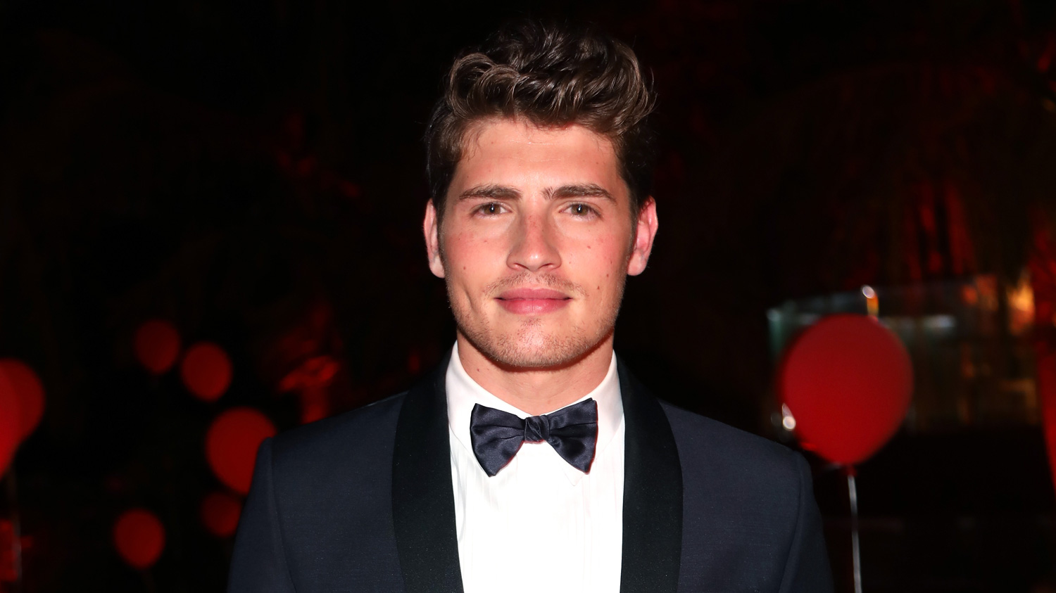Gregg Sulkin Could Pass for James Bond at Just Jared Halloween Party ...