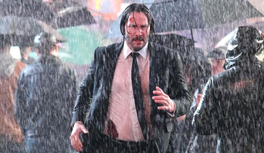 Keanu Reeves Runs Through Rainy Times Square for ‘John Wick’ | John ...