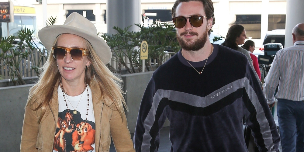Aaron & Sam Taylor-Johnson Hold Hands While Departing LAX! | Aaron ...