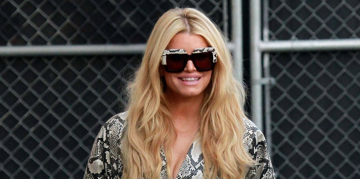 Jessica Simpson Rocks Snakeskin-Print Jumpsuit While Arriving at ...