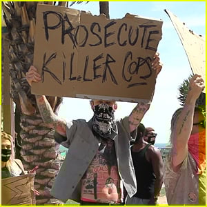 Machine Gun Kelly Holds ‘Prosecute Killer Cops’ Sign During Protest in ...