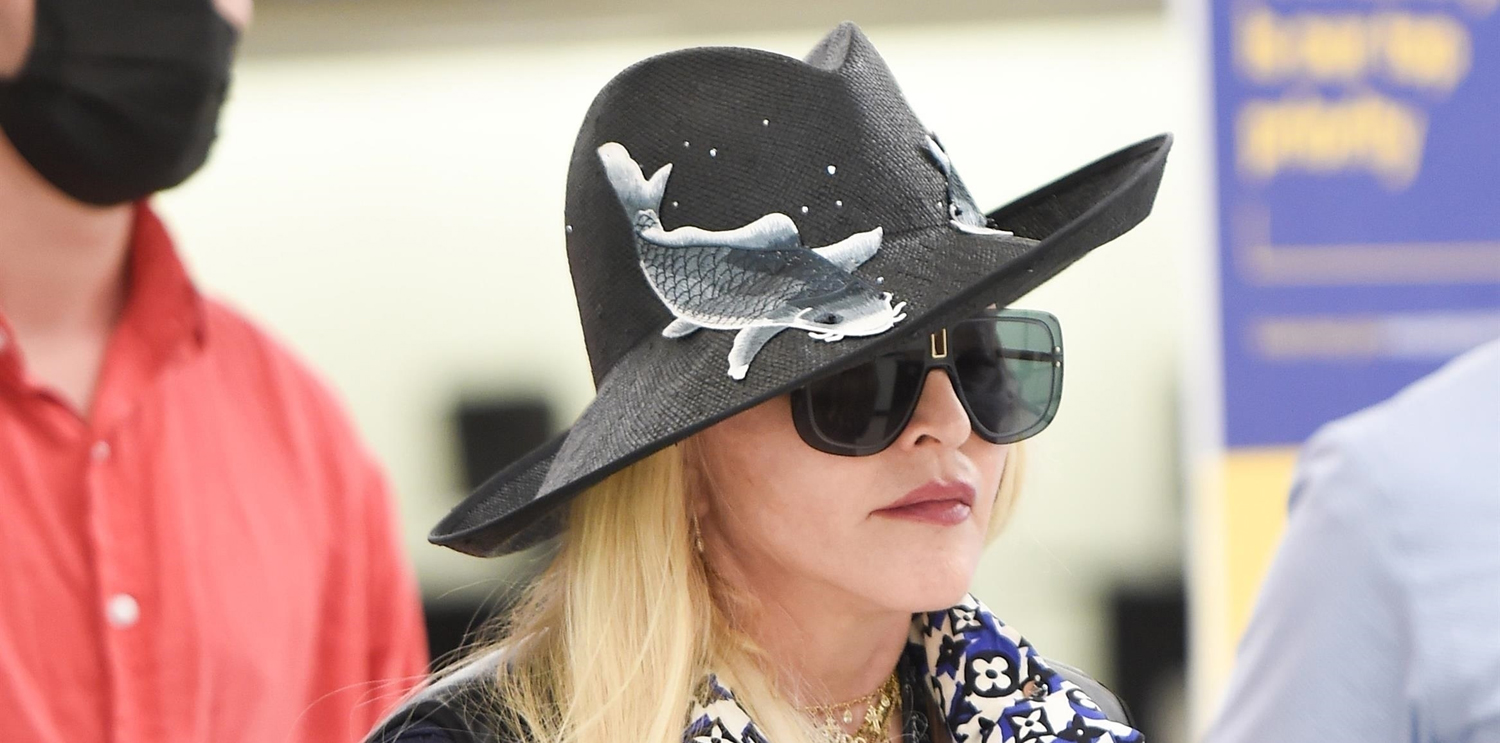 Madonna Wears Fish-Print Hat for Flight Out of NYC | Madonna | Just ...