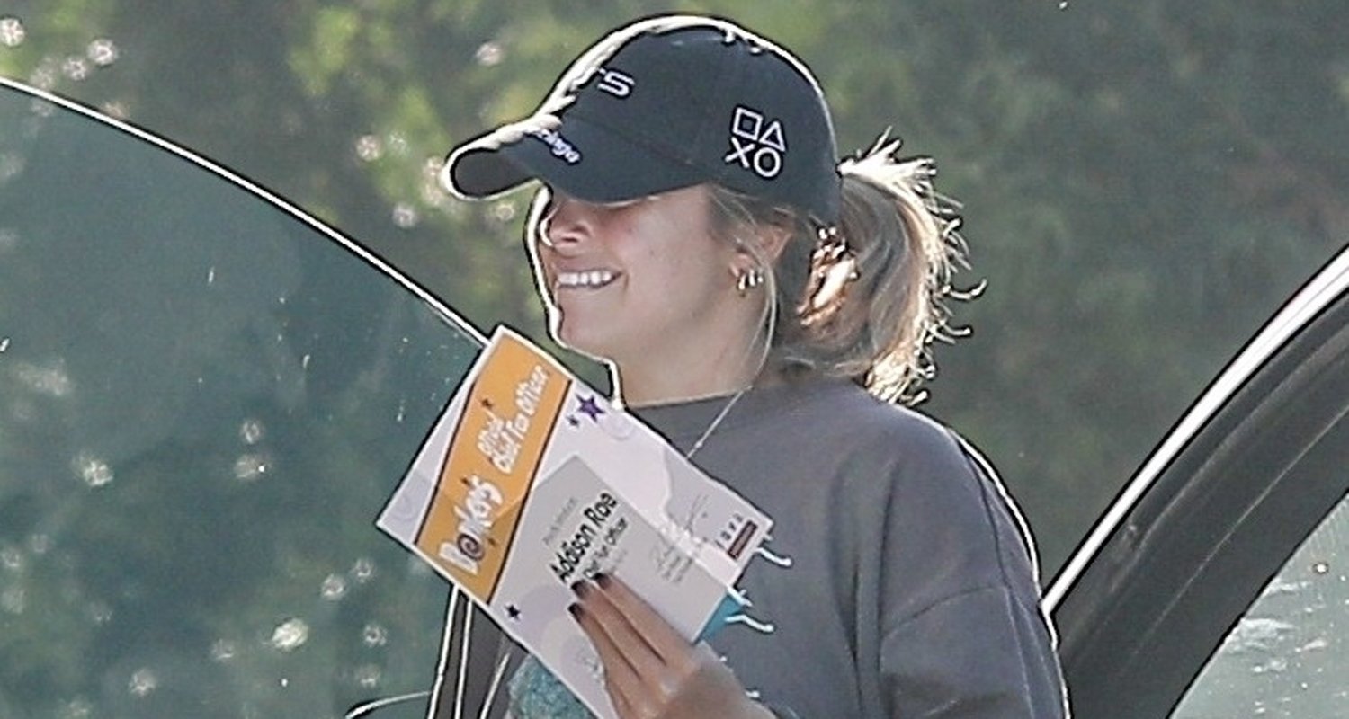 Addison Rae Pairs Baggy T-Shirt with Rain Boots During Day Out in Sunny ...