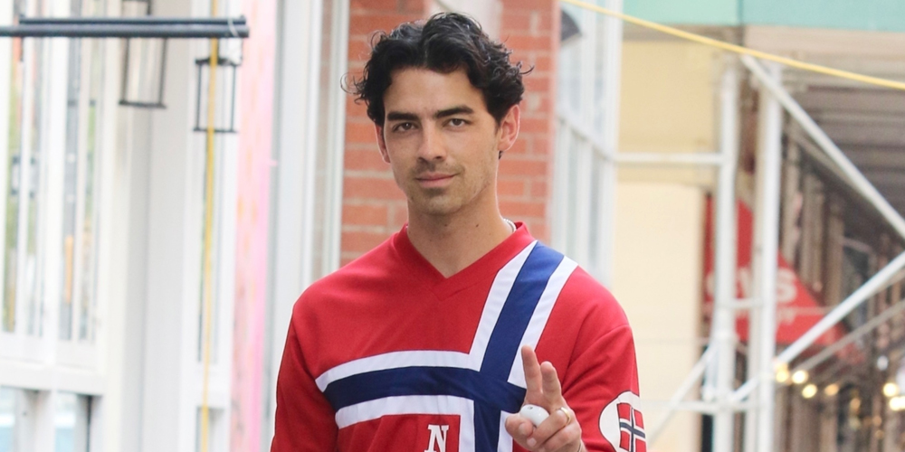 Joe Jonas Flashes a Peace Sign, Reps Norway Soccer Jersey Ahead of FIFA ...